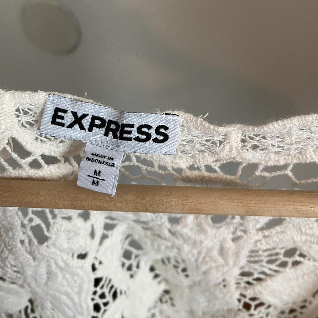 Express vest Knitted vest, super cute but I have too... - Depop