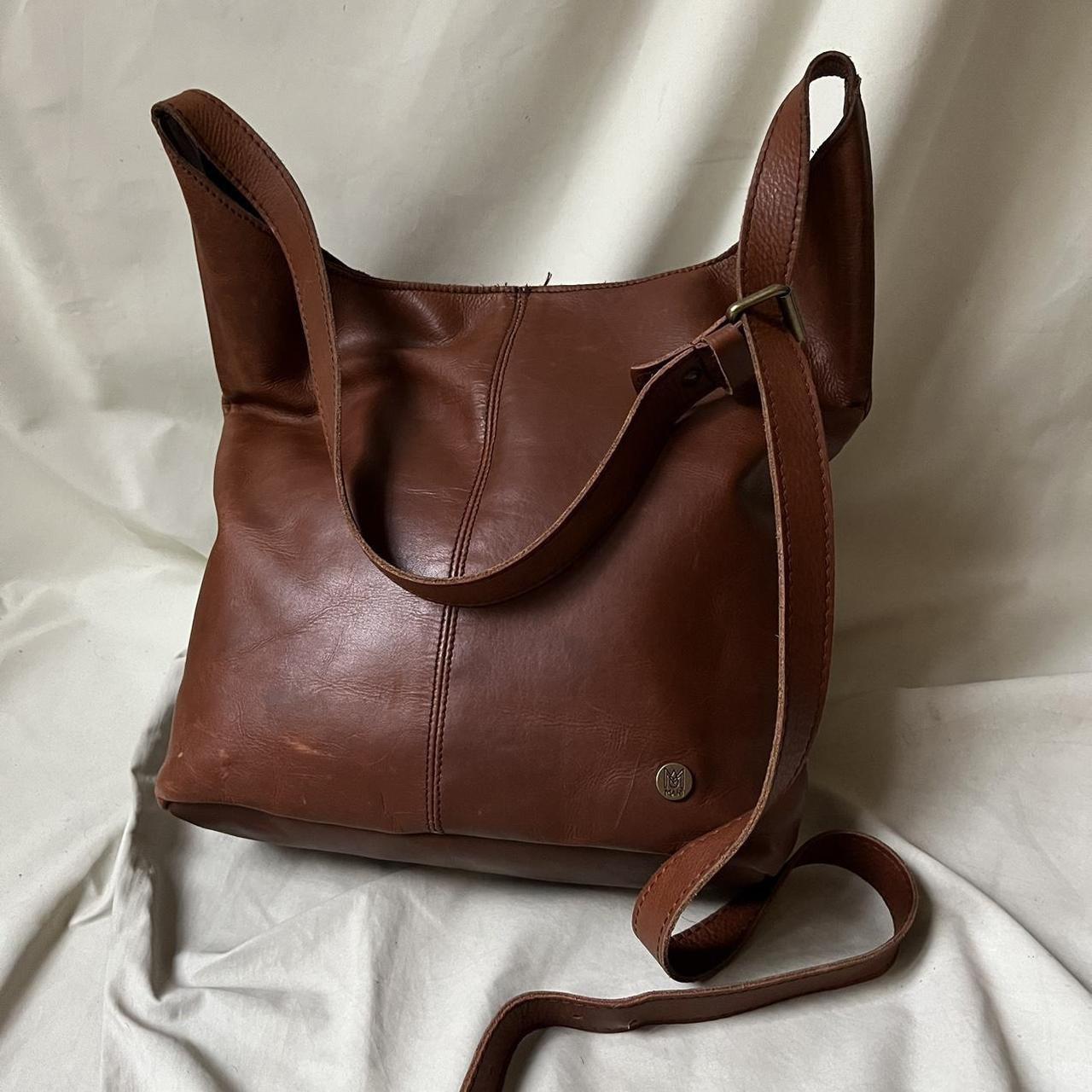 Vintage brown leather crossbody hobo bag. Real,... | Depop