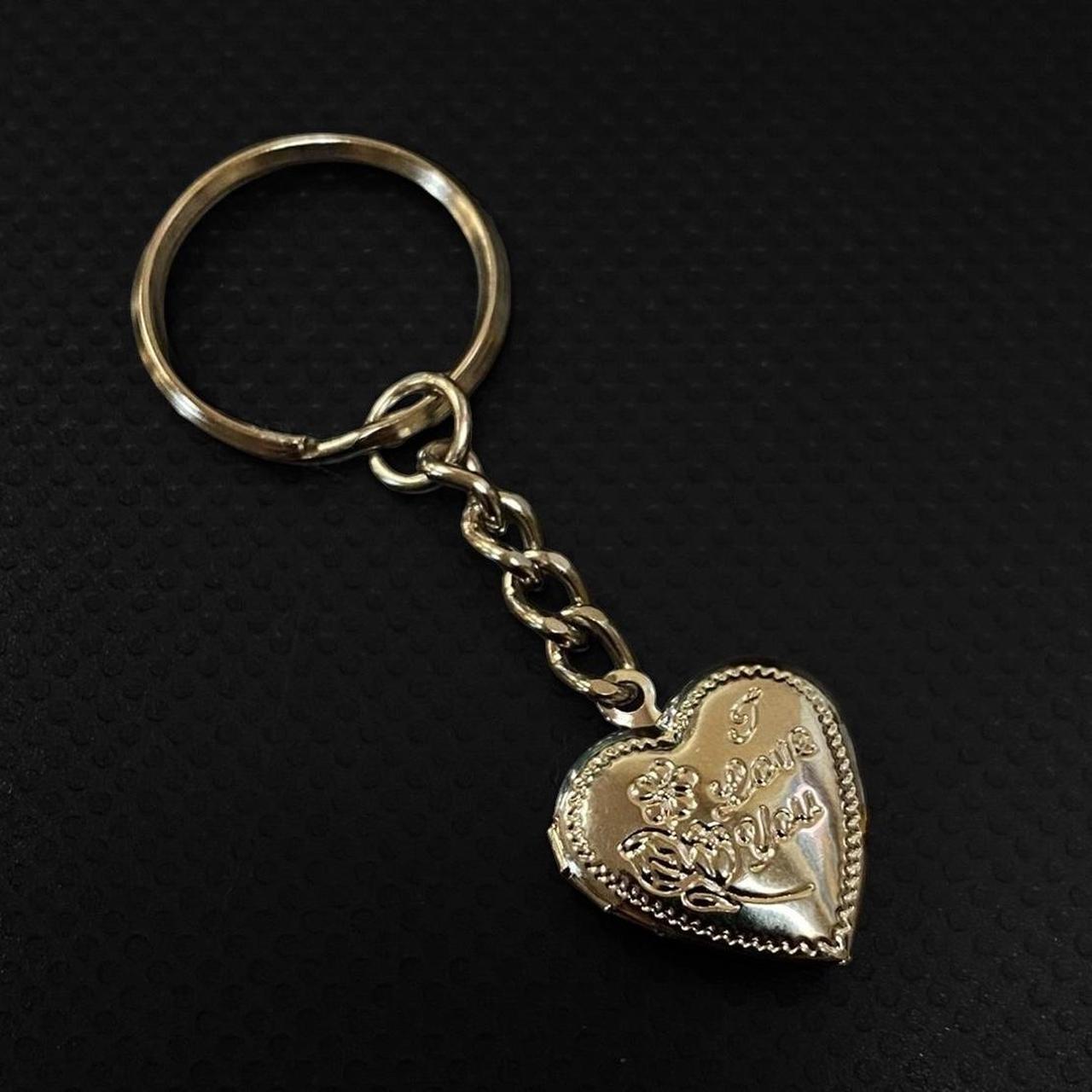 Heart locket keychain. This keychain holds 2 photos.... - Depop