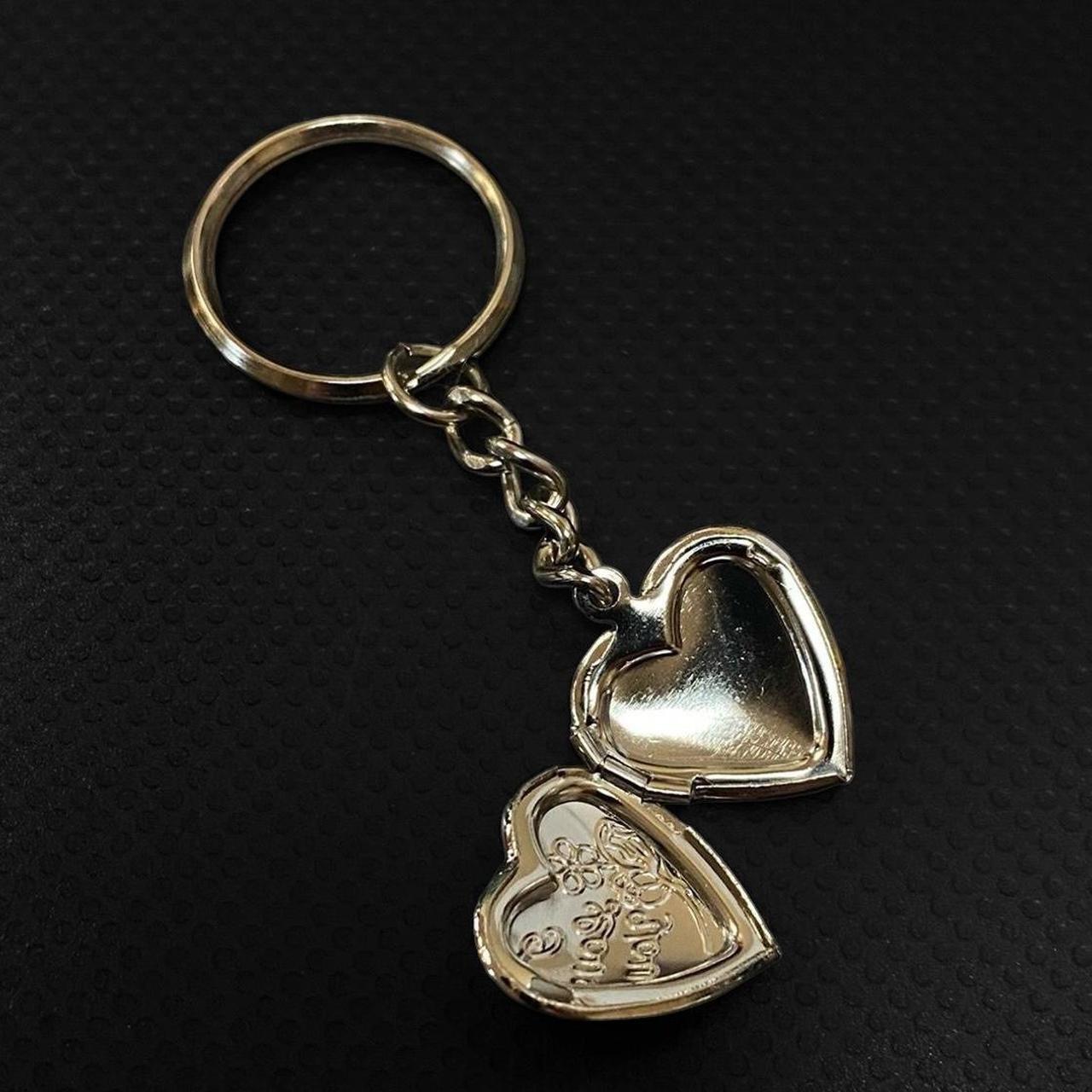 Heart locket keychain. This keychain holds 2 photos.... | Depop