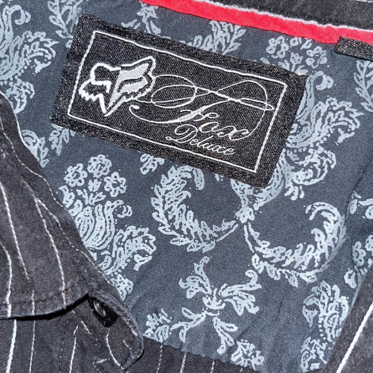 Large. Black y2k fox racing short sleeve button up... - Depop