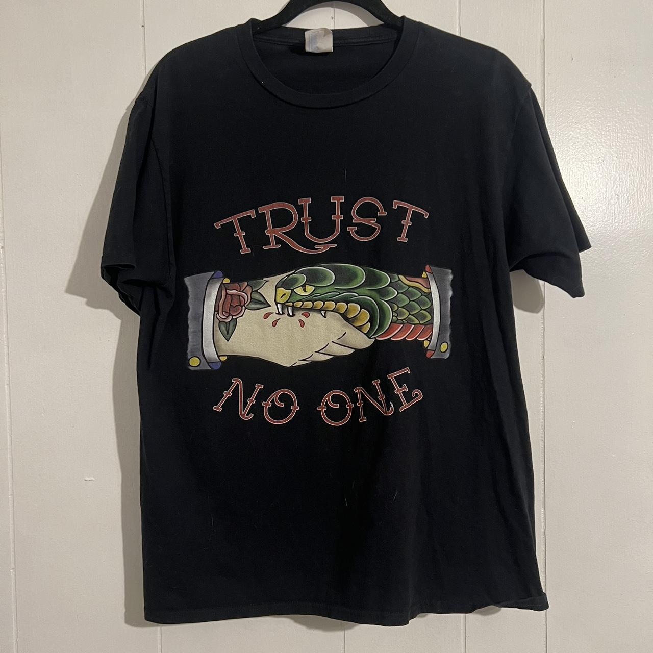 Large graphic tee with no flaws expect a small hole... - Depop