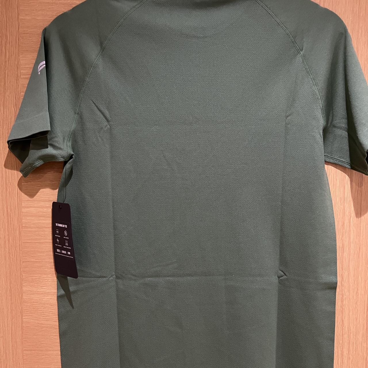 Fabletics Men's Green T-shirt | Depop