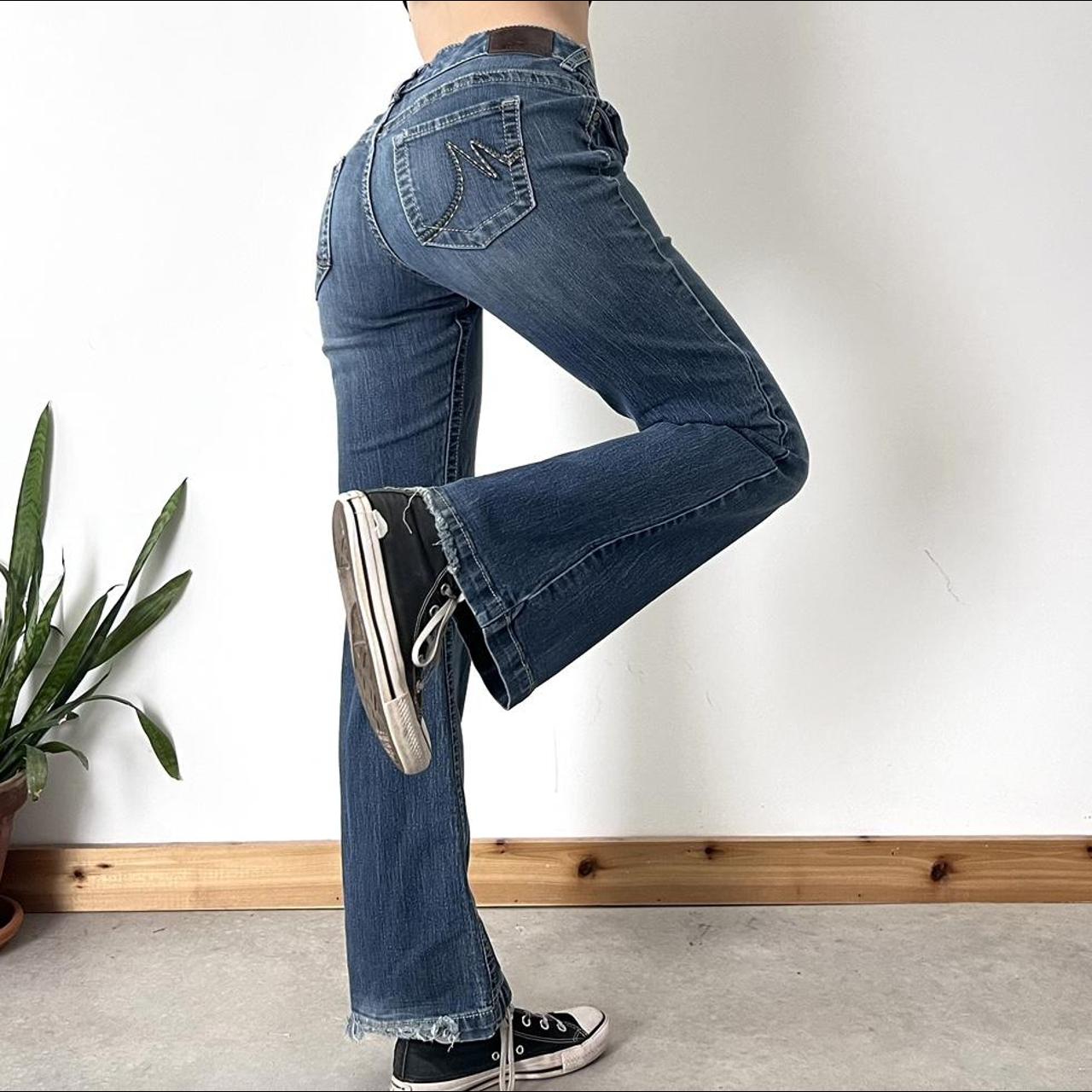 2000s flare jeans Low rise fit. Some light wear at... - Depop