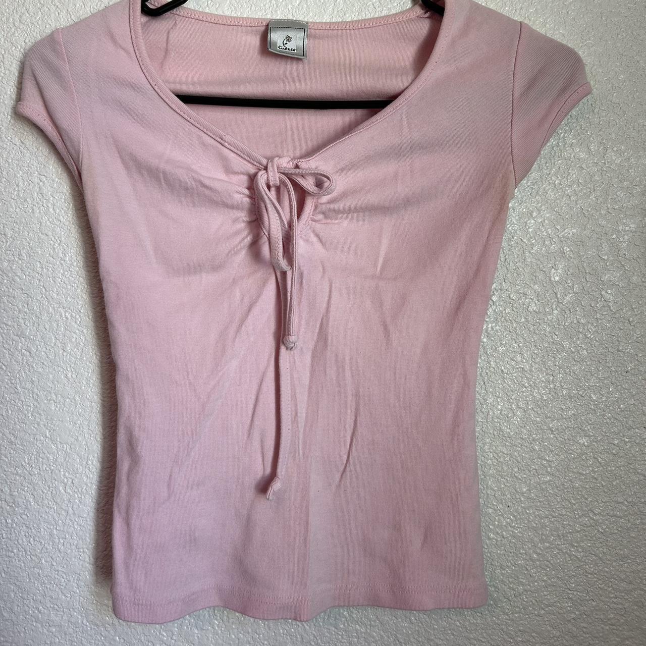baby doll tee with tie front has slight pilling... - Depop
