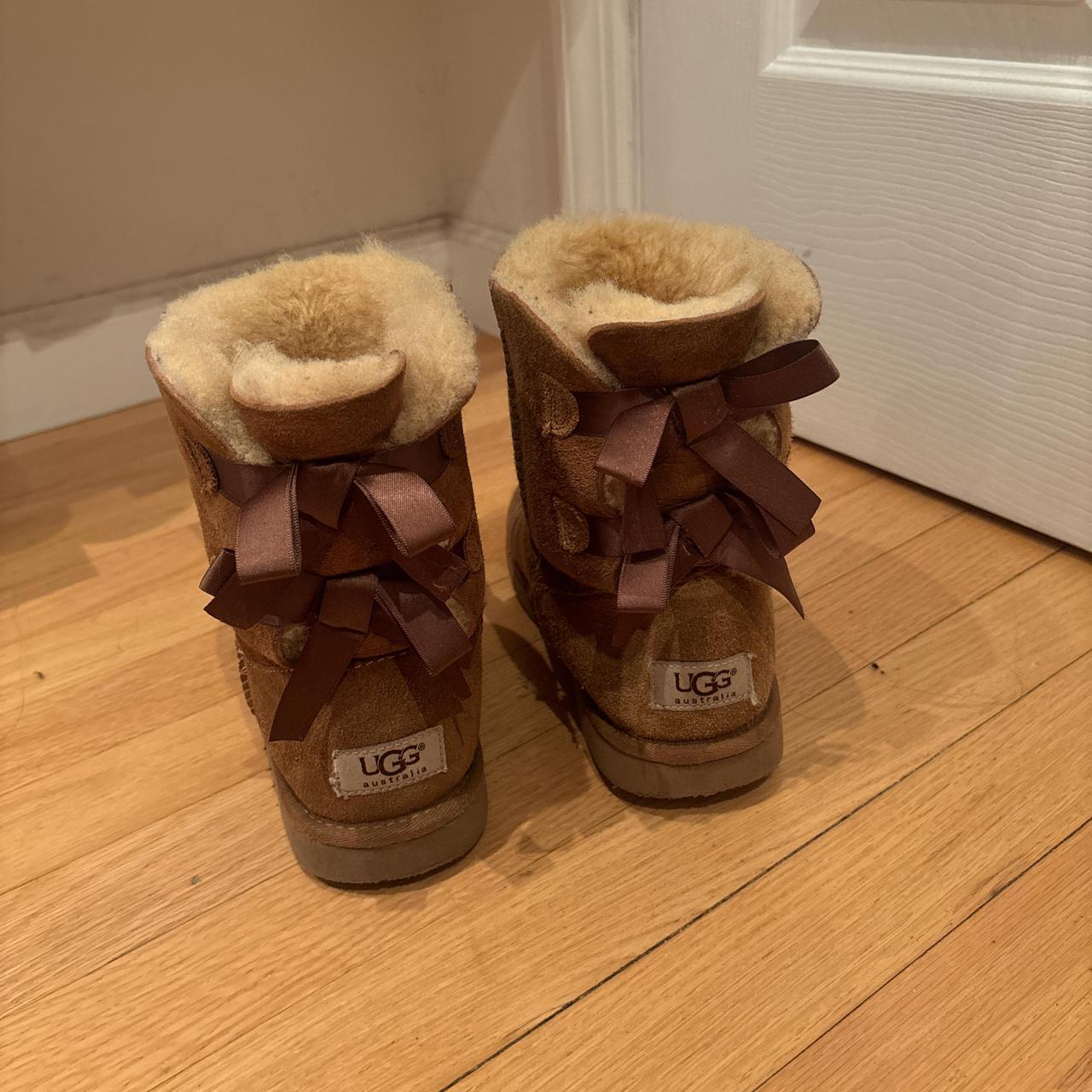 Brown UGG boots with bows, SIZE: 4. In great... - Depop
