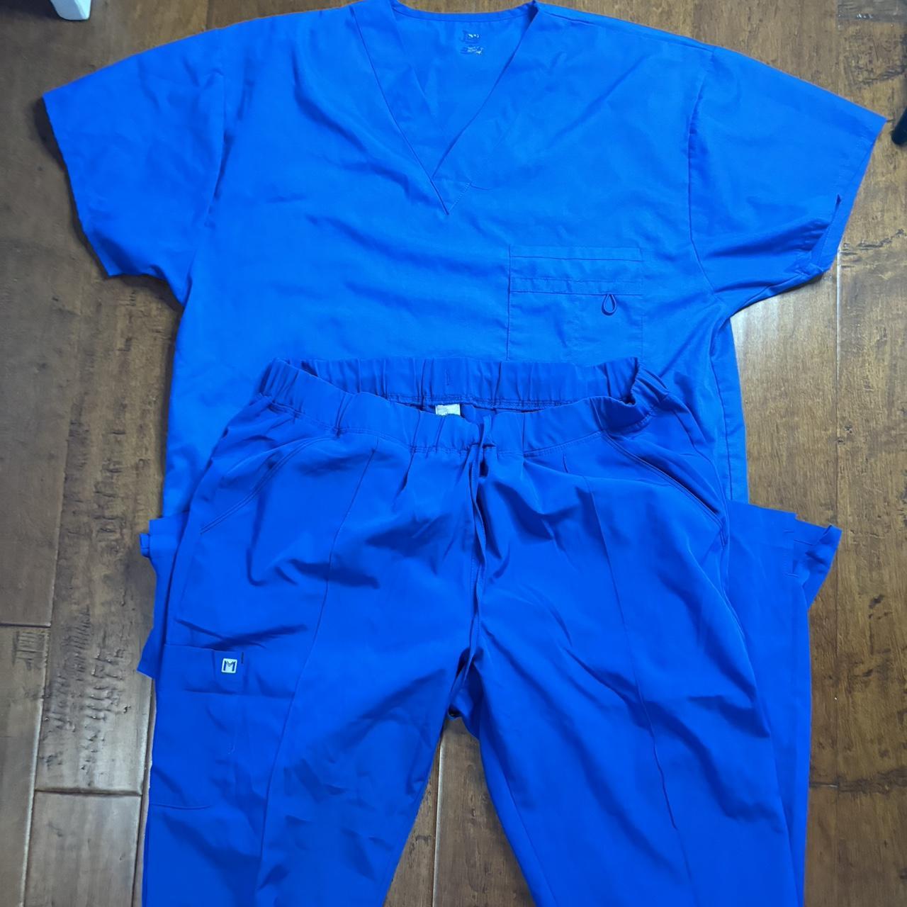 Blue scrub set for women, including top and bottoms... - Depop