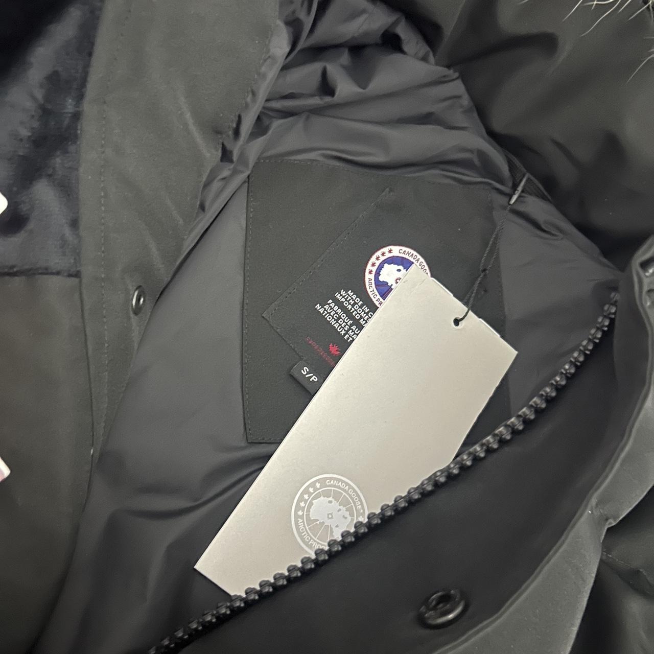 Black with red badge CG coat unisex Size S would fit... - Depop