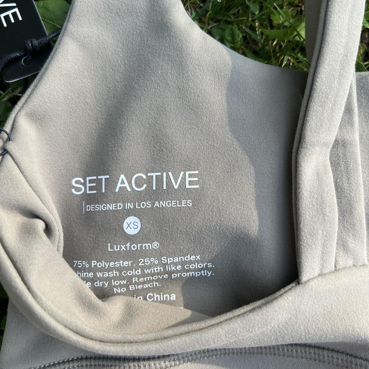 Set active razor back sports bra. There isn’t a ton... - Depop