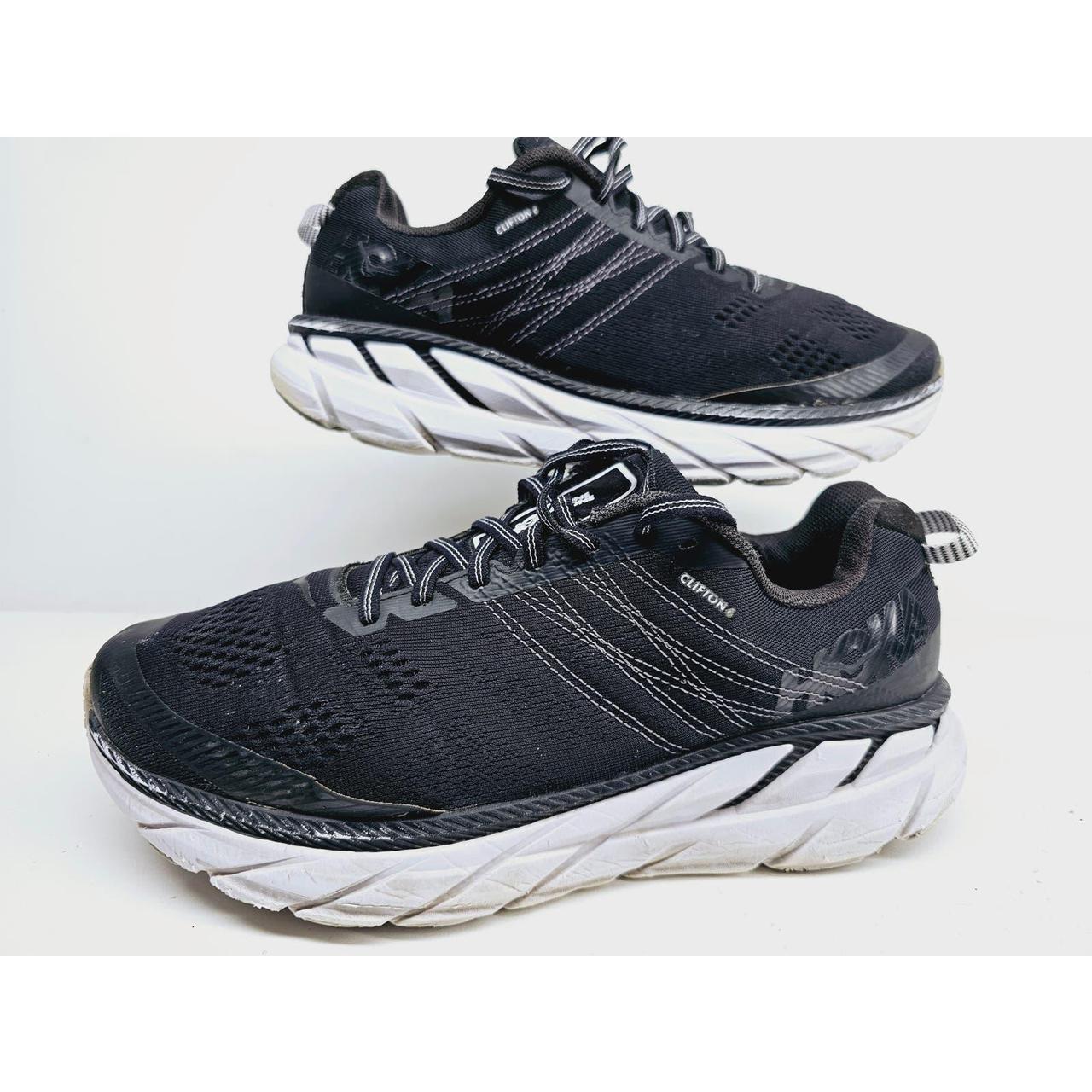 This advertisement features a pair of Hoka Women's... - Depop