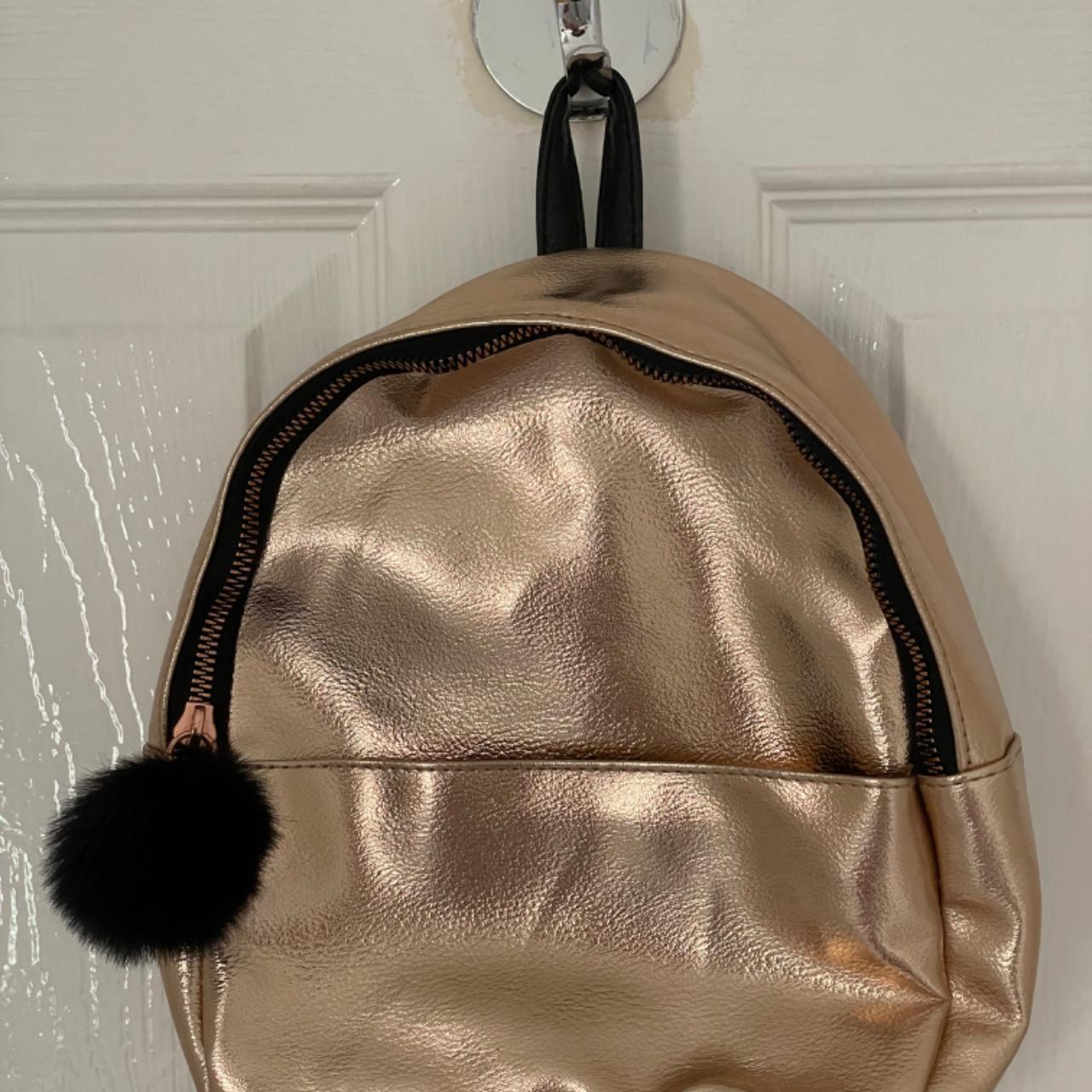 Rose gold mini backpack - Depop