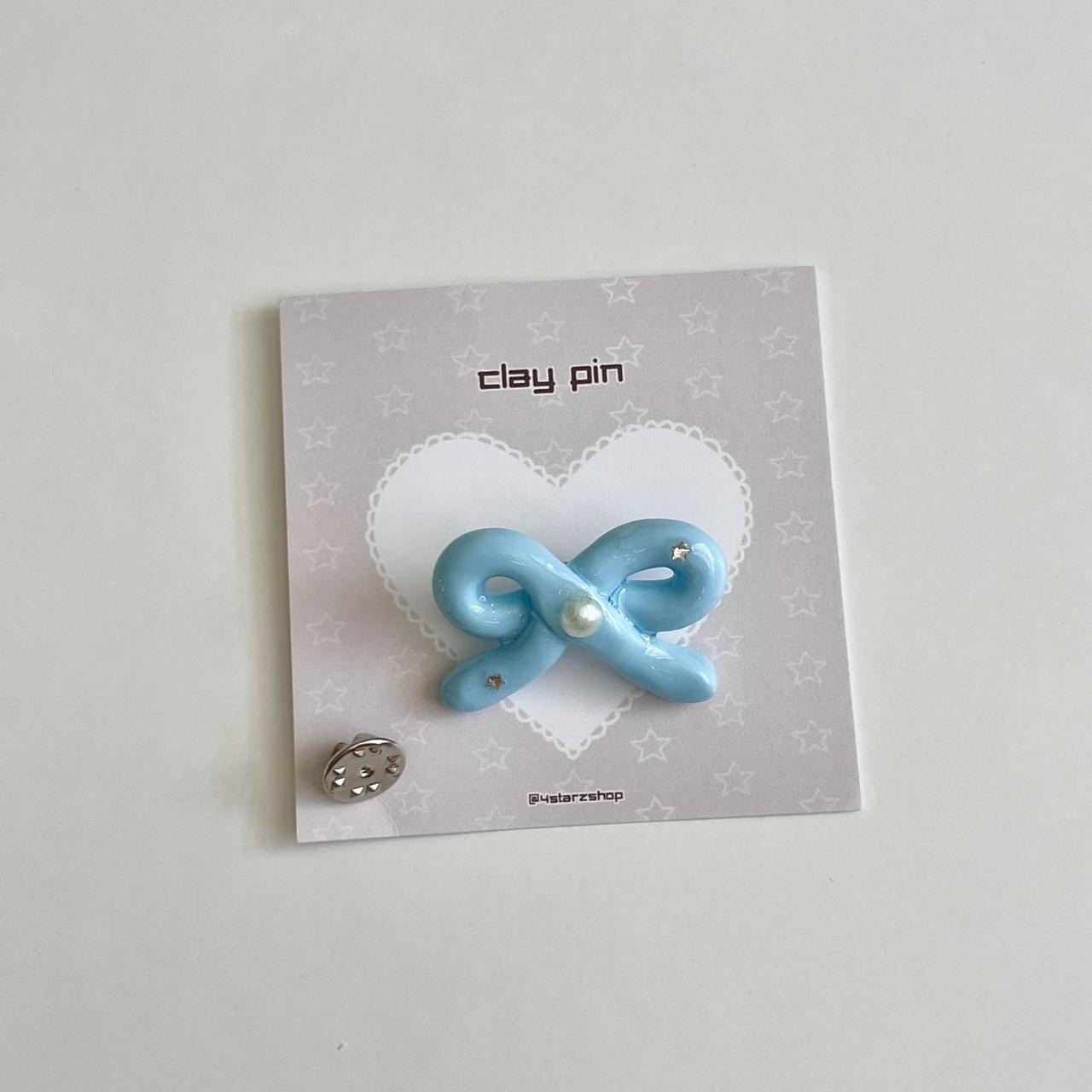 handmade polymer clay bow pin features: ☆ baby blue... | Depop