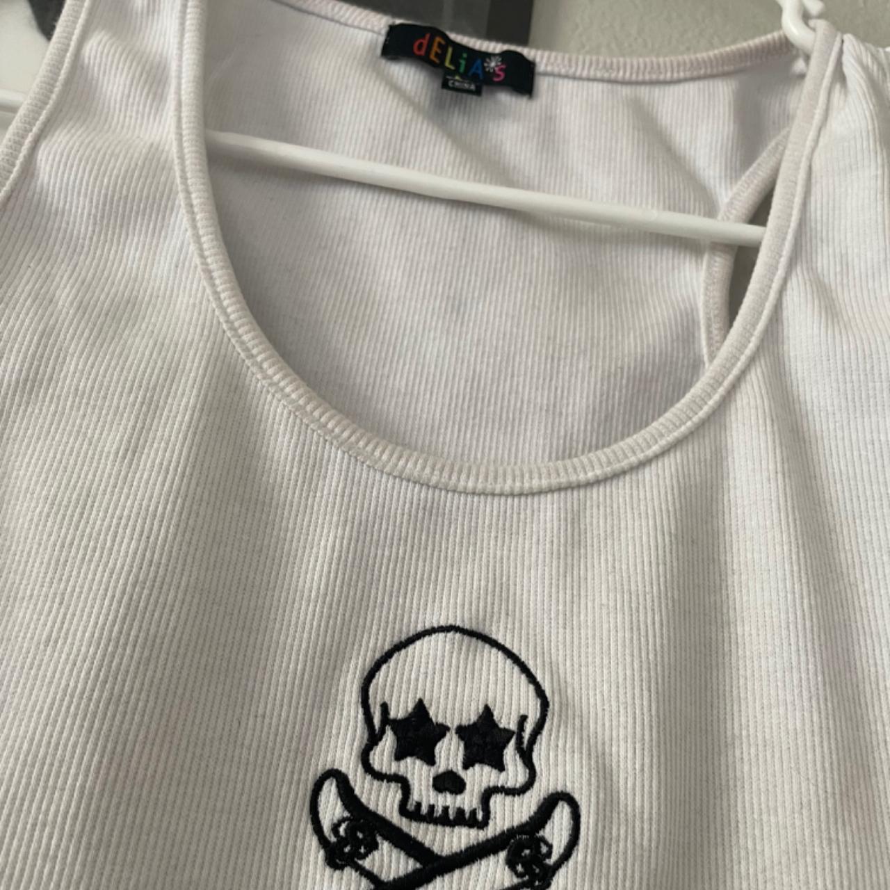 delia’s skull crop top has some wear to it but... - Depop