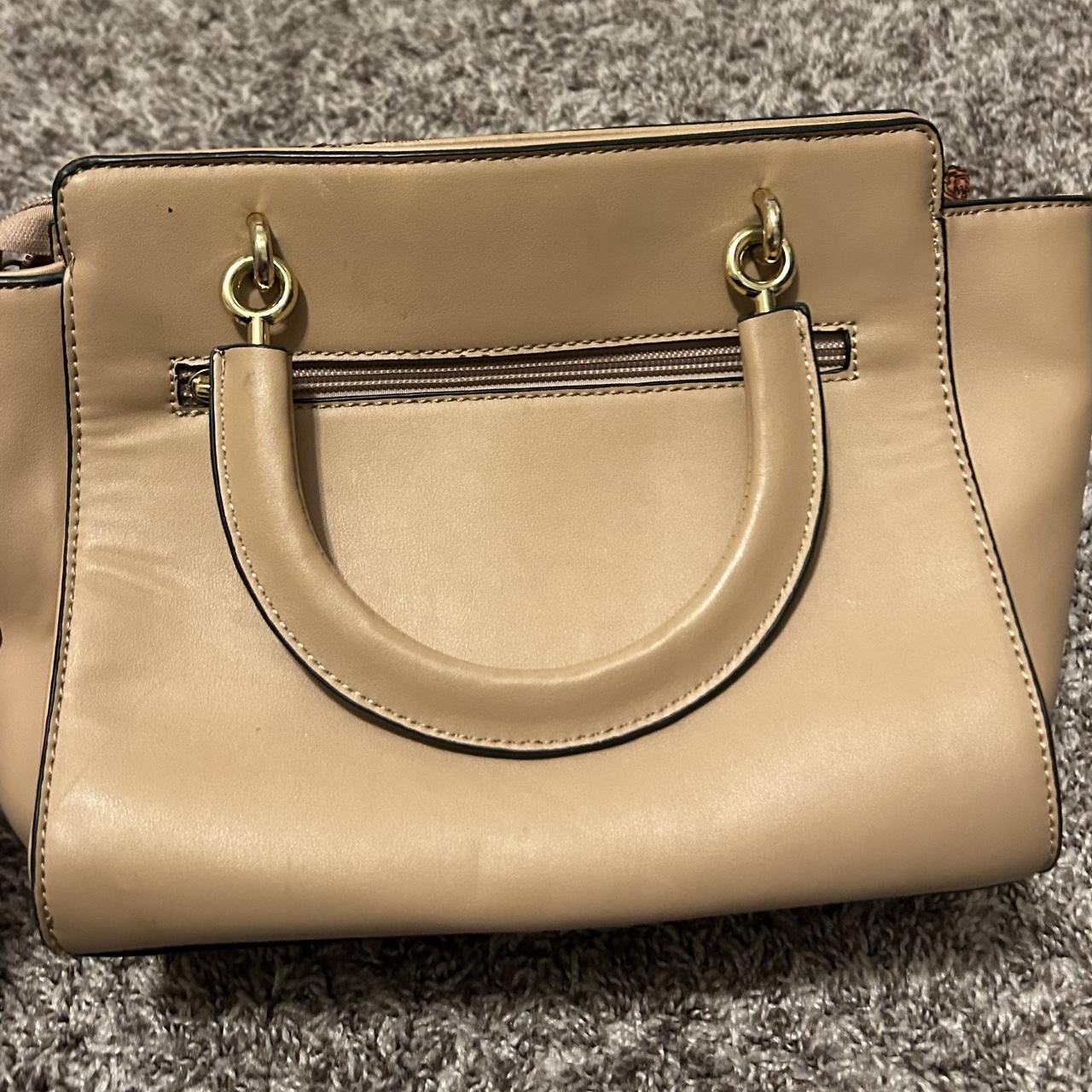 Cute light brown handheld purse, comes with 3... - Depop