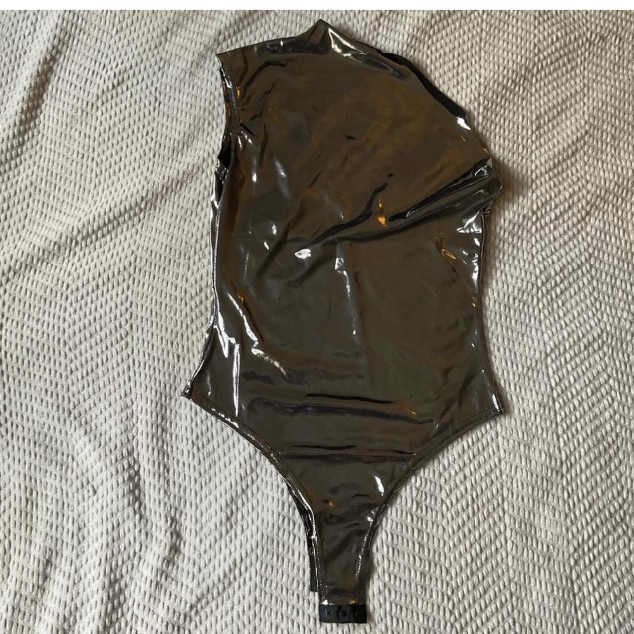 New Metallic Bodysuit - Silver with snap closure... - Depop
