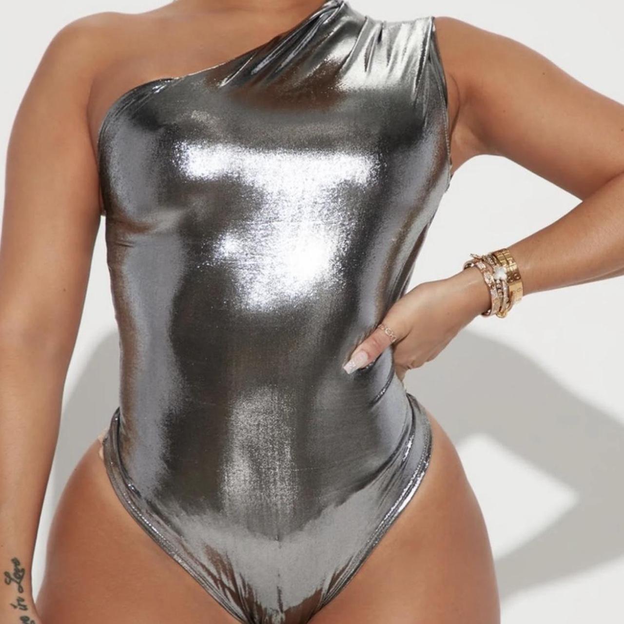 New Metallic Bodysuit - Silver with snap closure... - Depop