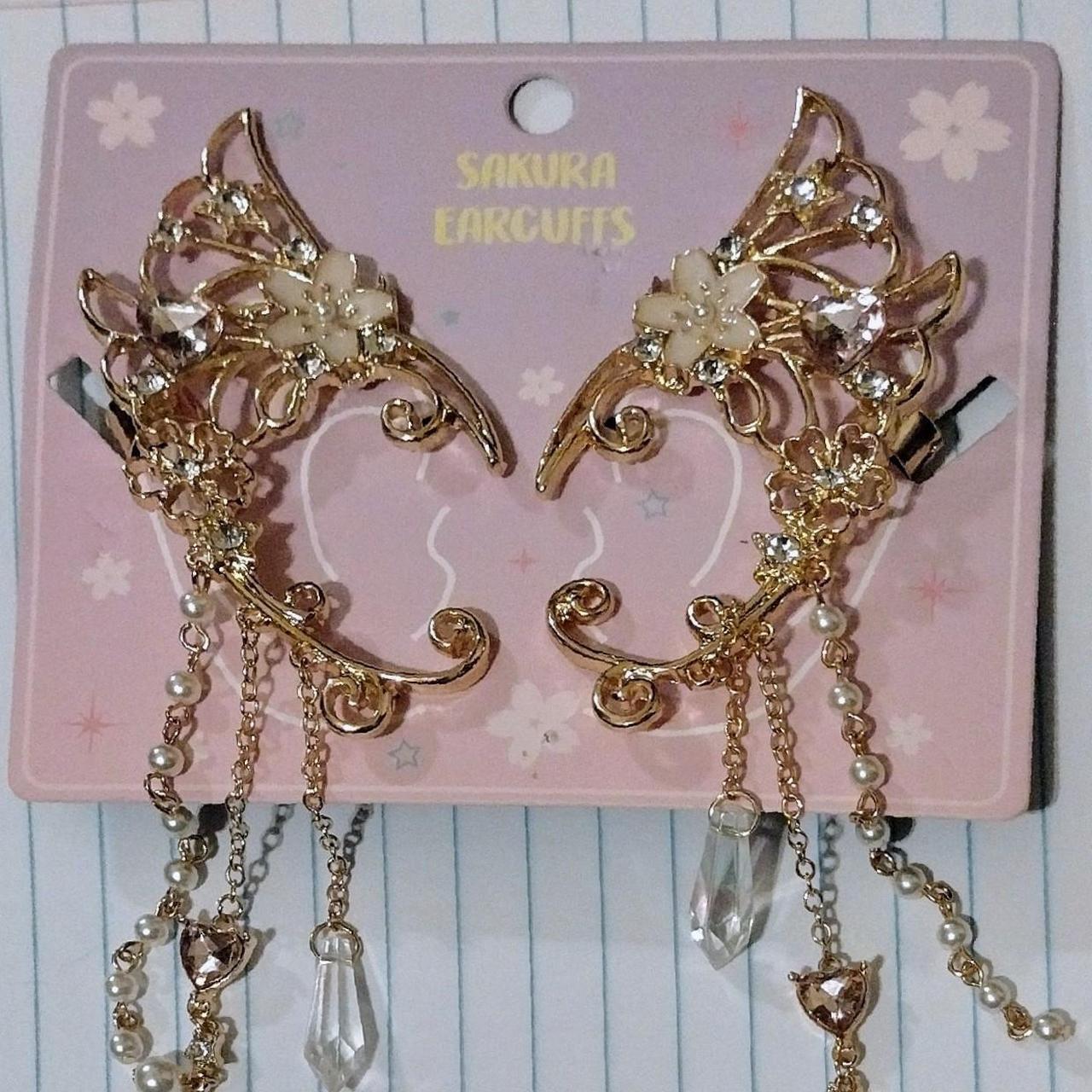 sakura ear cuffs worn once, comes with original... - Depop