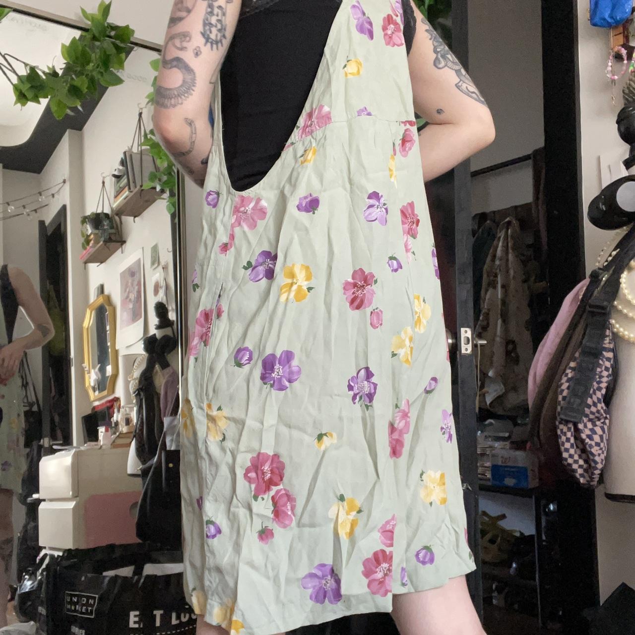 Express floral overall romper with the cutest button... - Depop