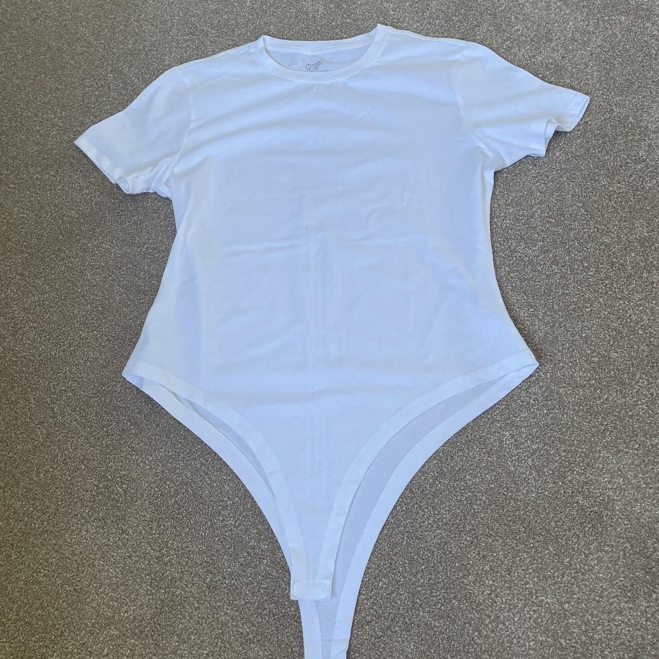 white tshirt style bodysuit - primark size large... - Depop