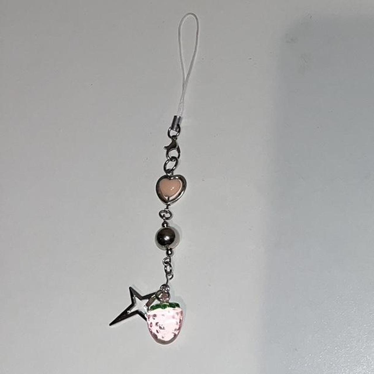 Pink and silver glass strawberry phone charm. The... - Depop