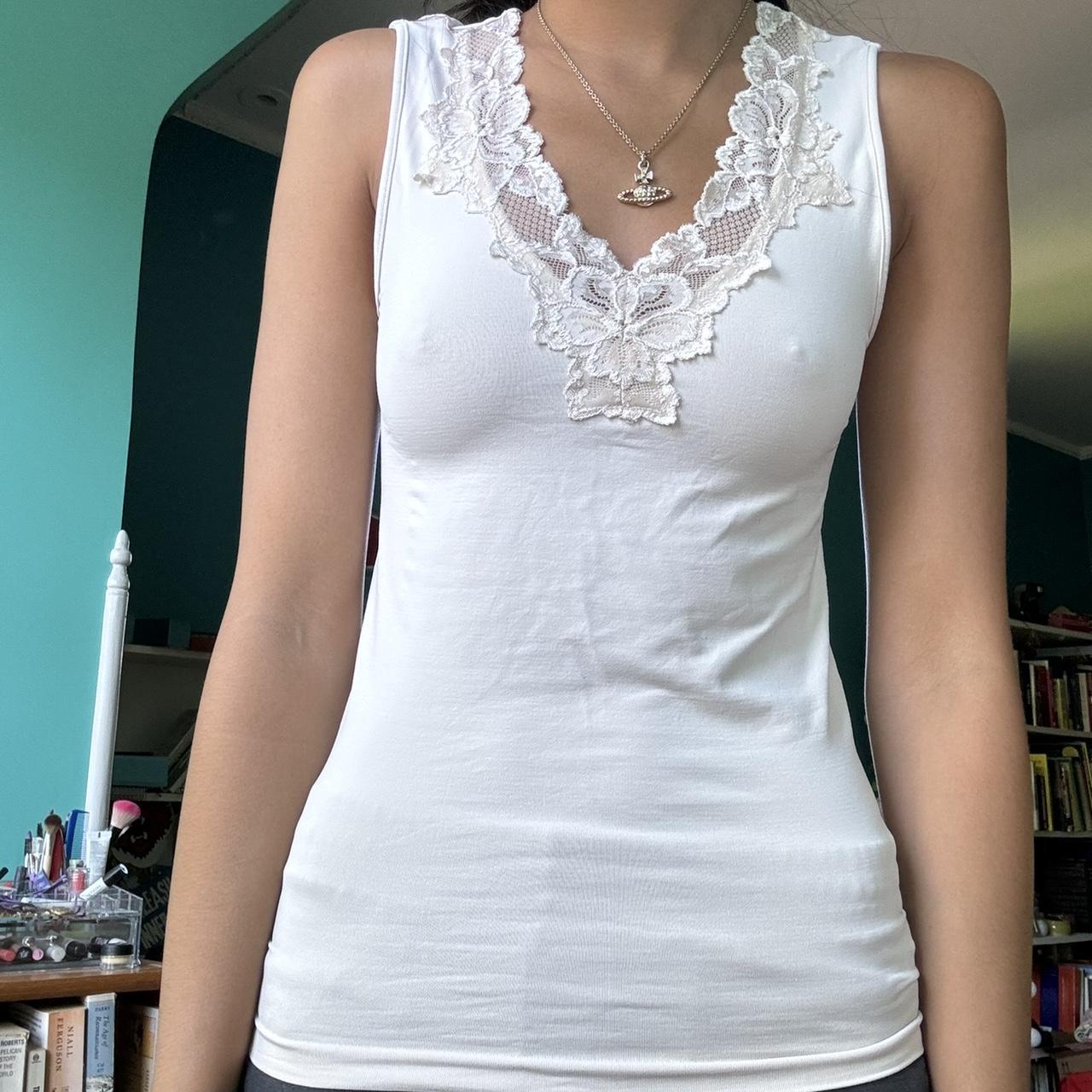 Seamless top with lace details. Message for more... | Depop