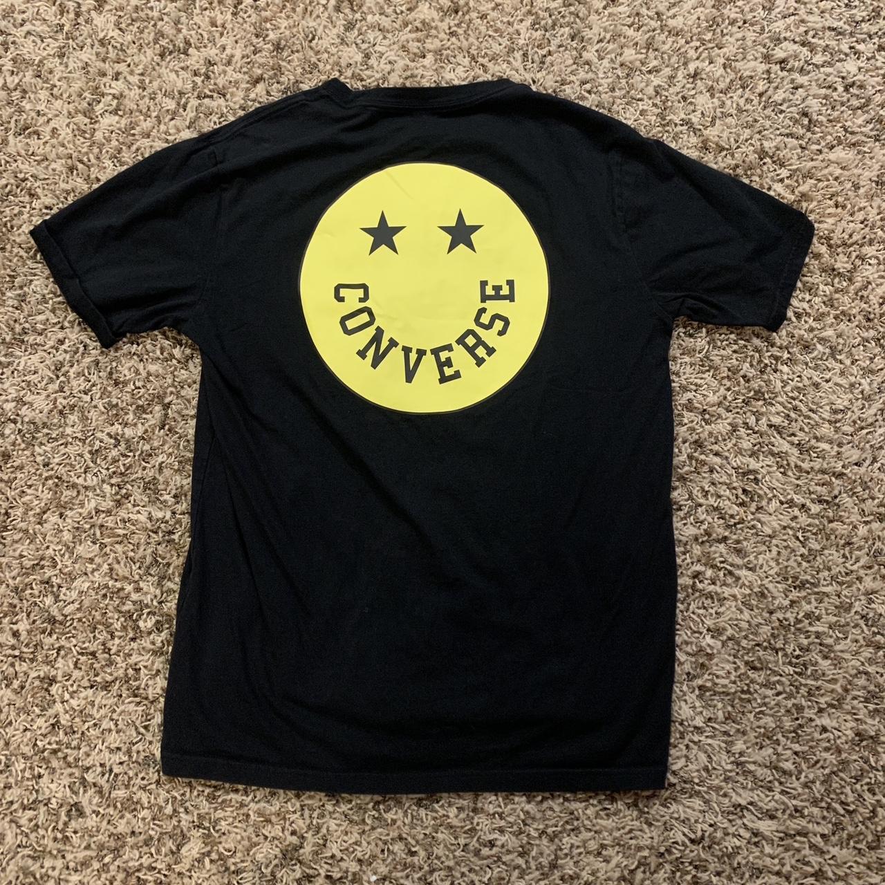 Black converse shirt with smiley face graphic on... - Depop