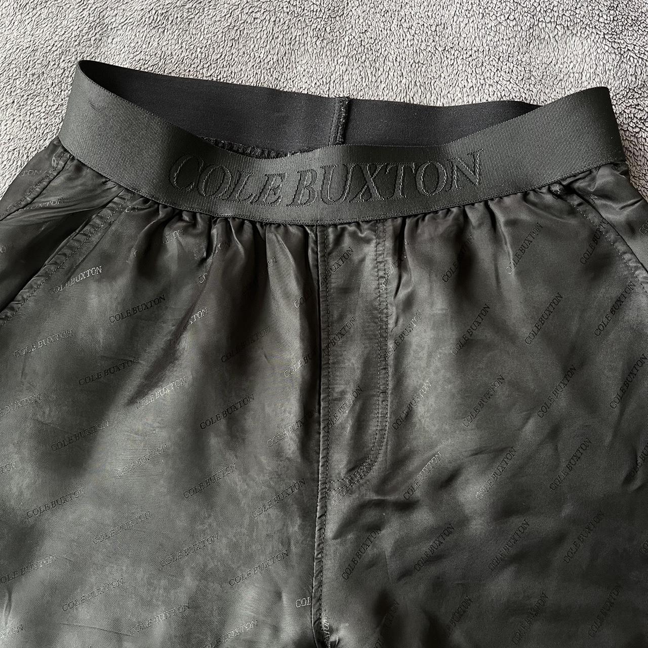 Cole Buxton black cupro trousers with logo | Depop