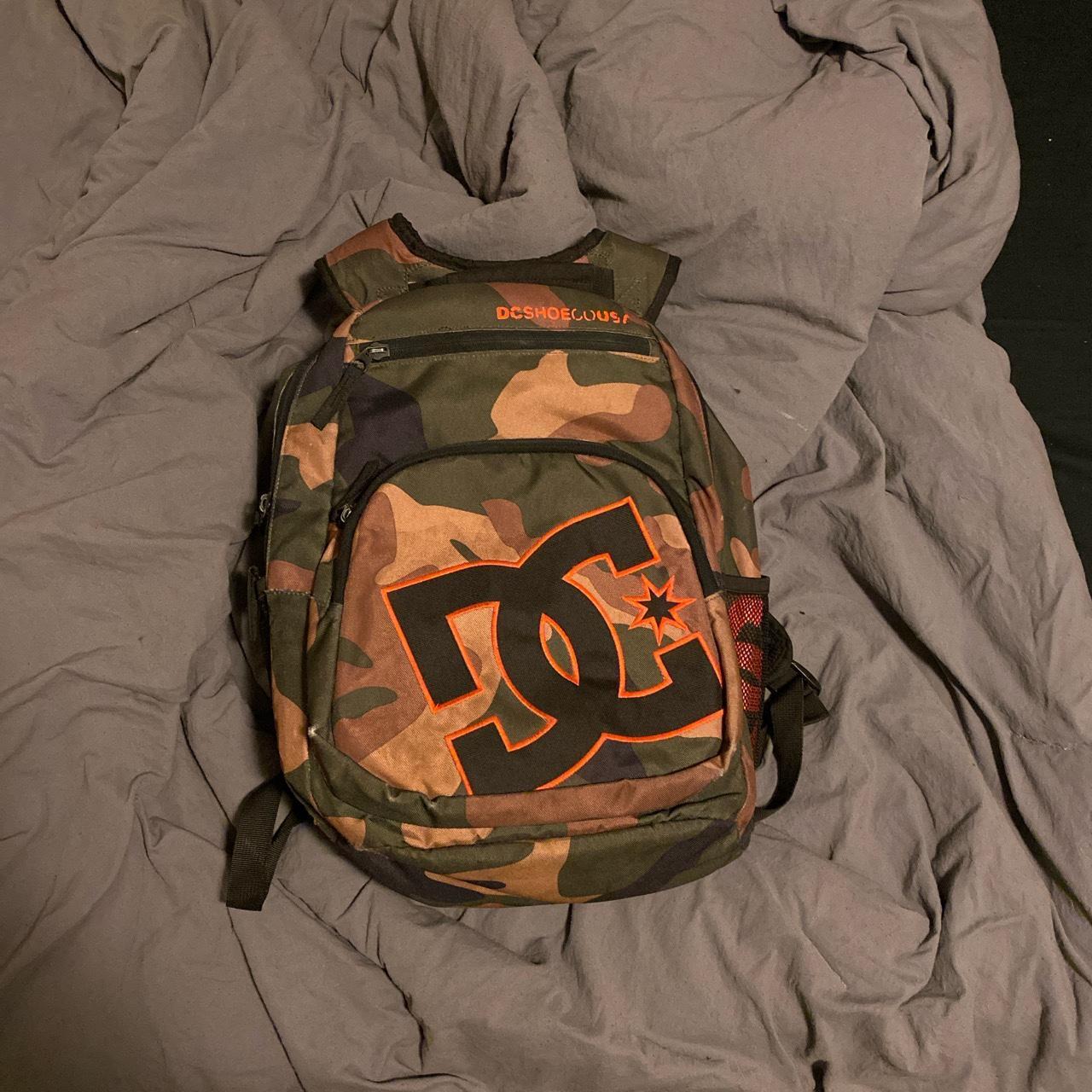 super dope camo and orange dc backpack wore this a... - Depop