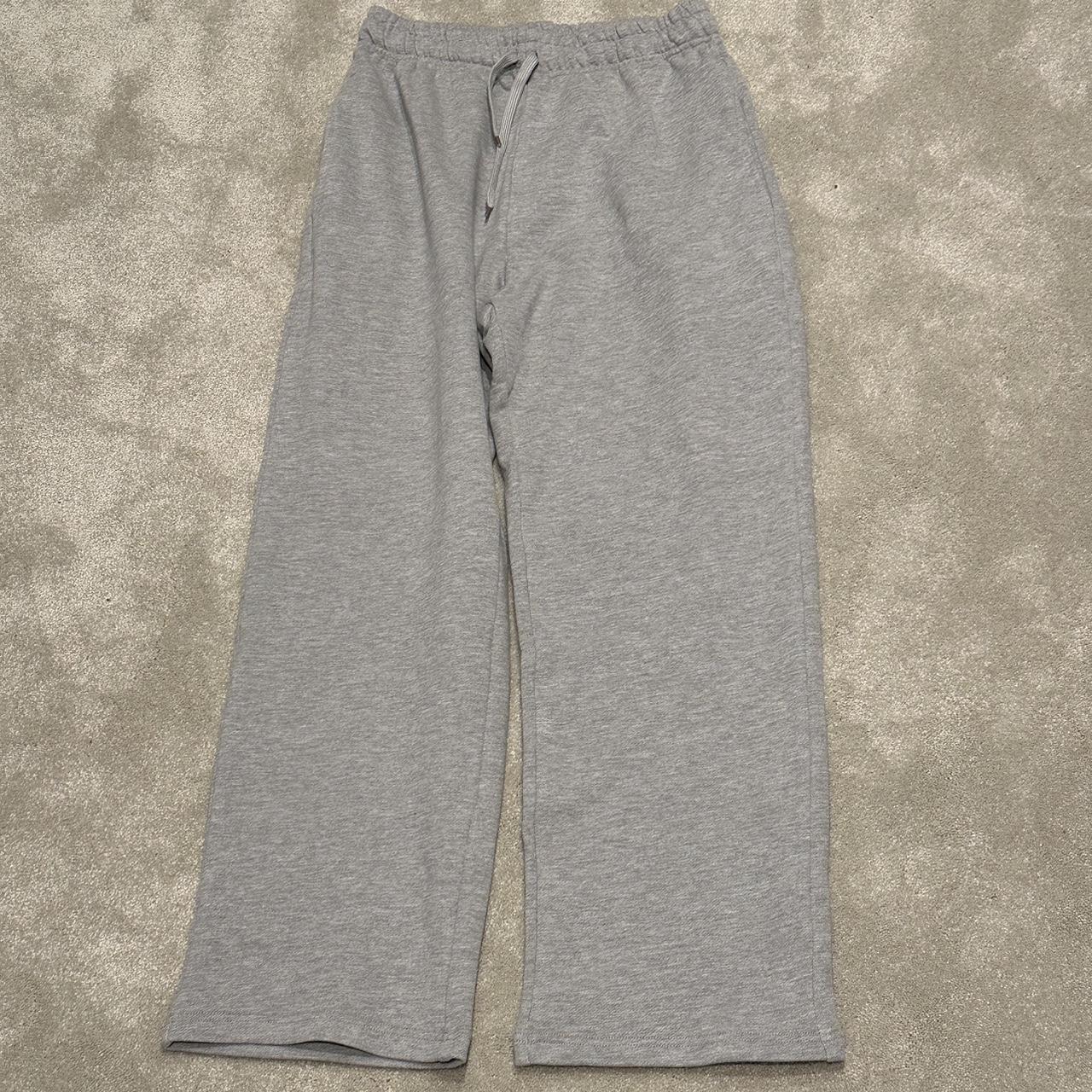 Baggy grey sweatpants, slightly flared Model is... - Depop