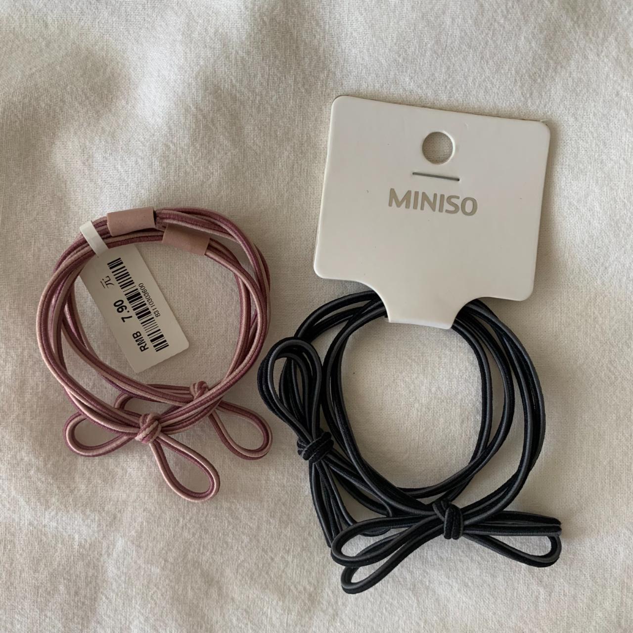 Miniso bow hair ties. 2 black and two pink. Brand... - Depop