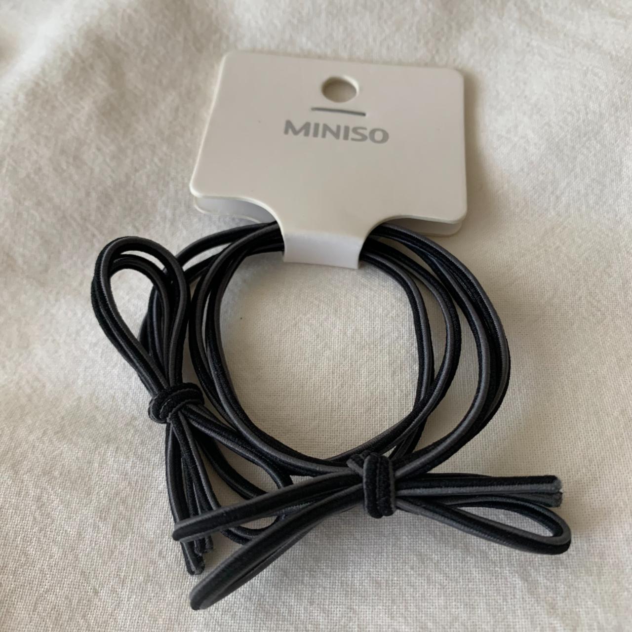 Miniso bow hair ties. 2 black and two pink. Brand... - Depop