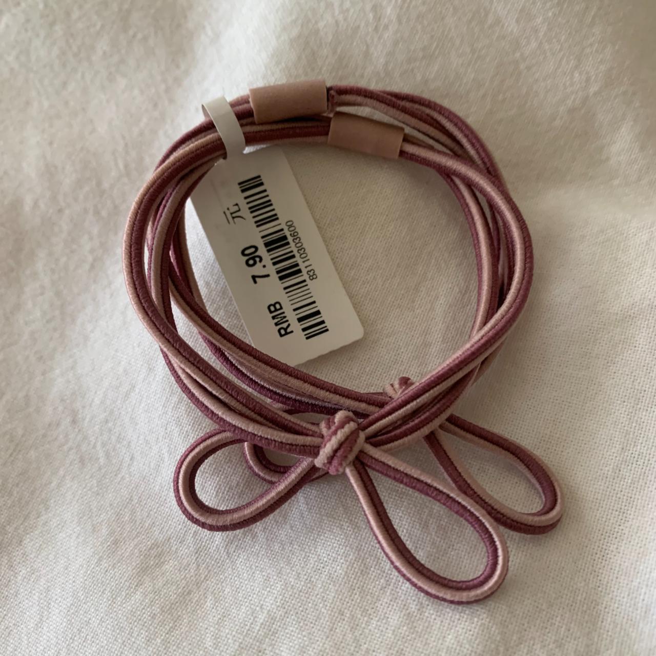 Miniso bow hair ties. 2 black and two pink. Brand... - Depop