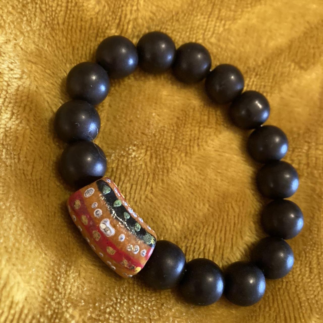This heavy hand painted bracelet is a Beautiful... - Depop