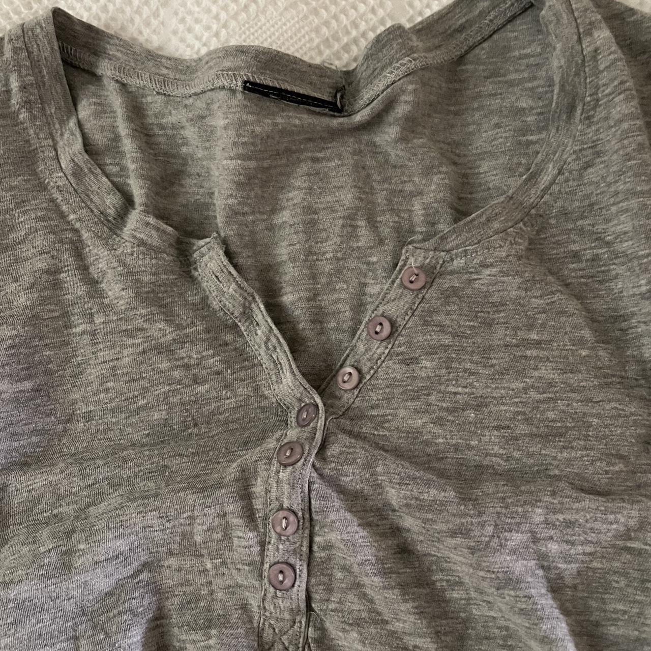 Super cute comfy half button down grey cropped top.... - Depop