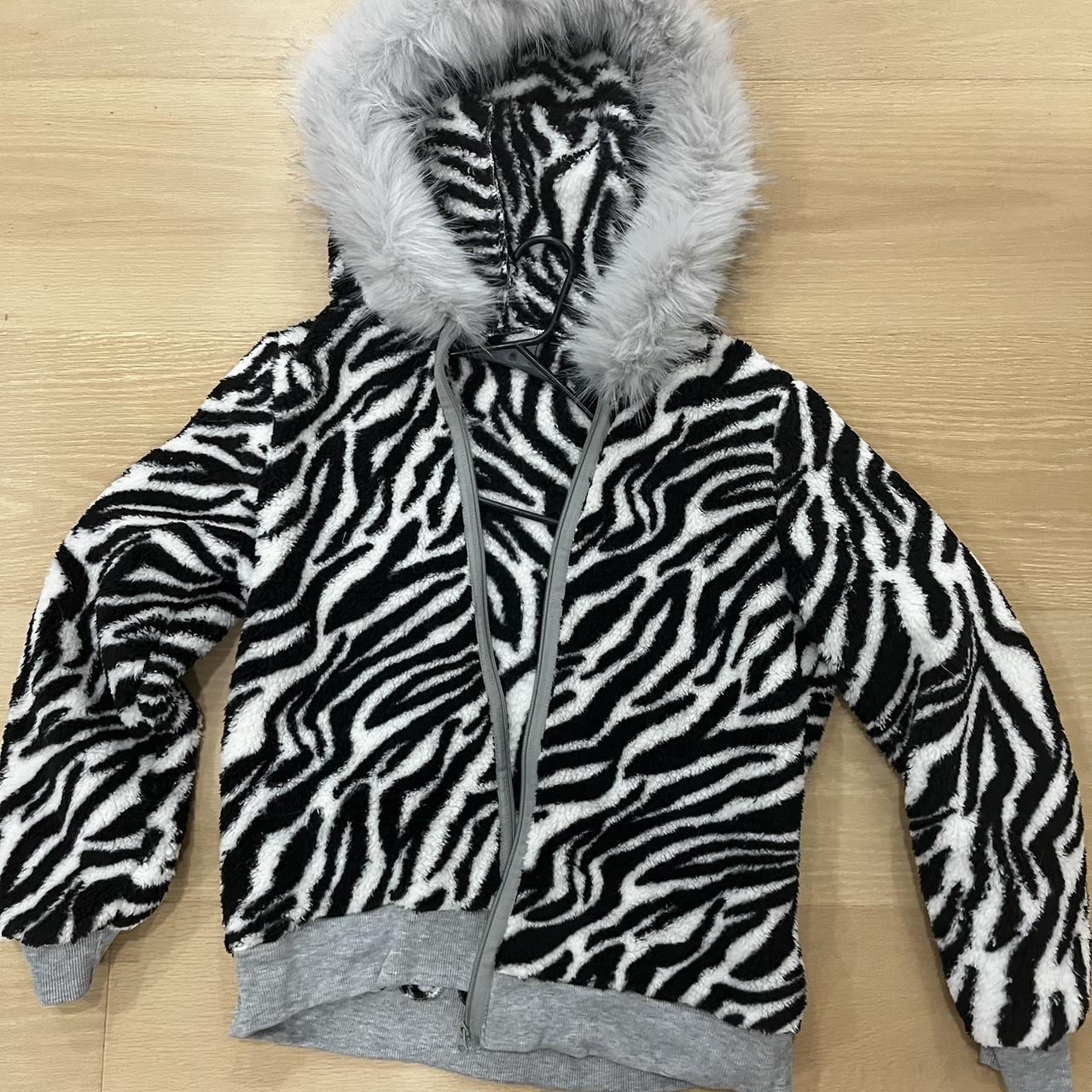 Fluffy Zebra print faux fur zip up hoodie Tagged... | Depop