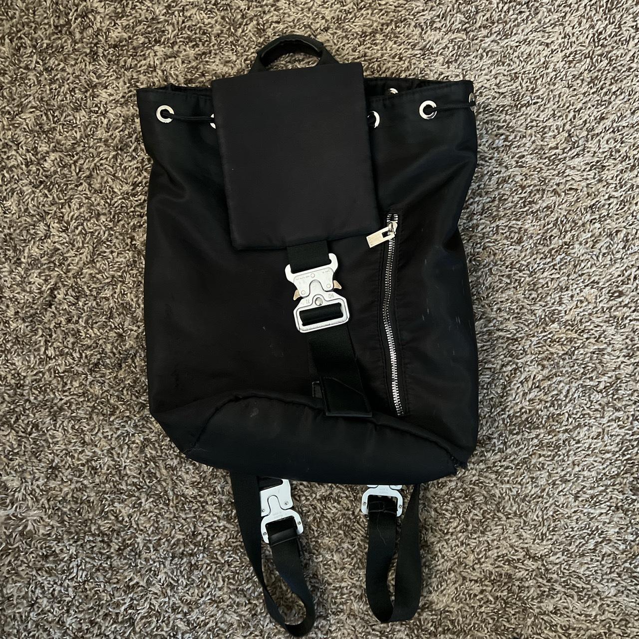 Alyx mini backpack, used very heavy, scuffs on... - Depop