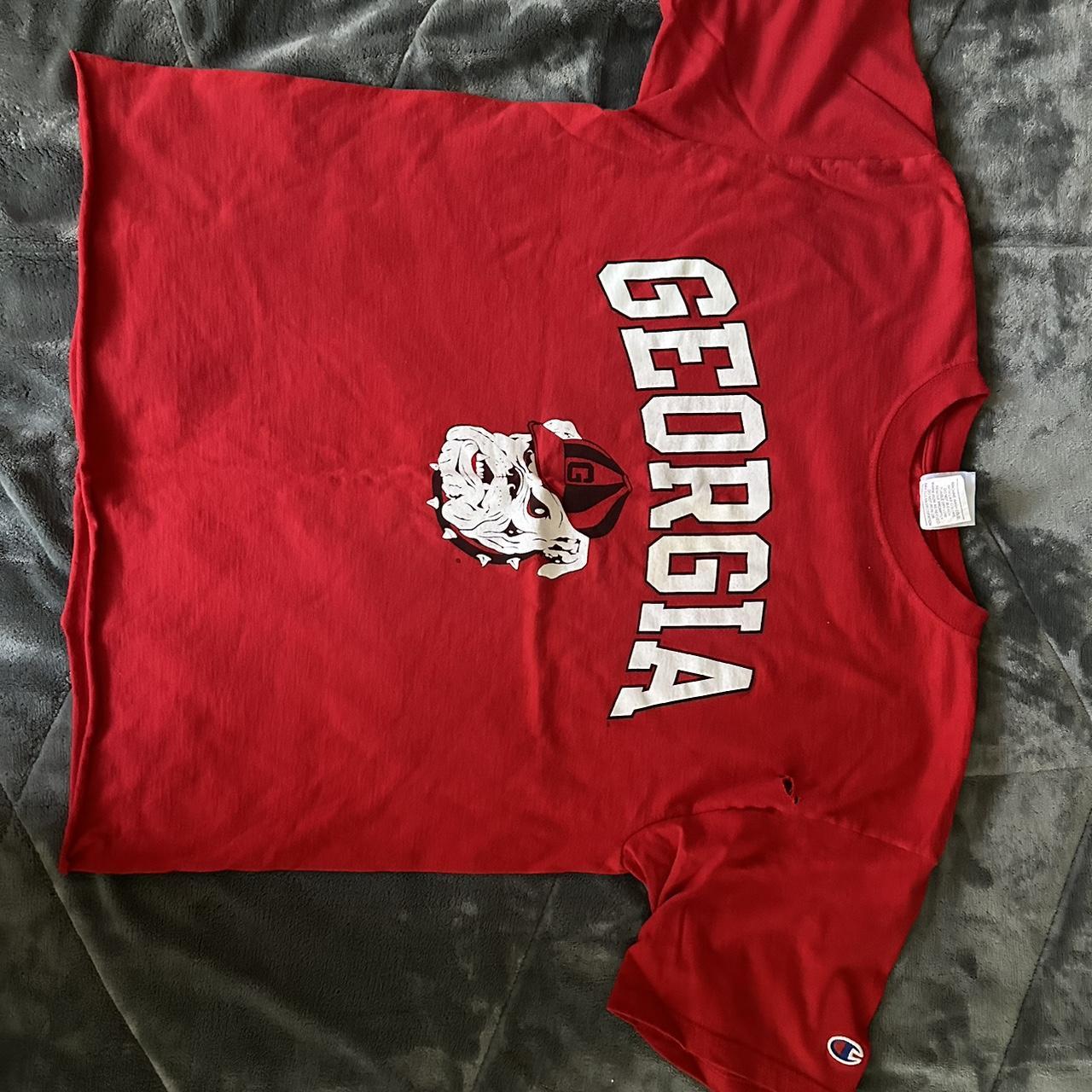 Georgia champion tee Has hole in front easily... - Depop