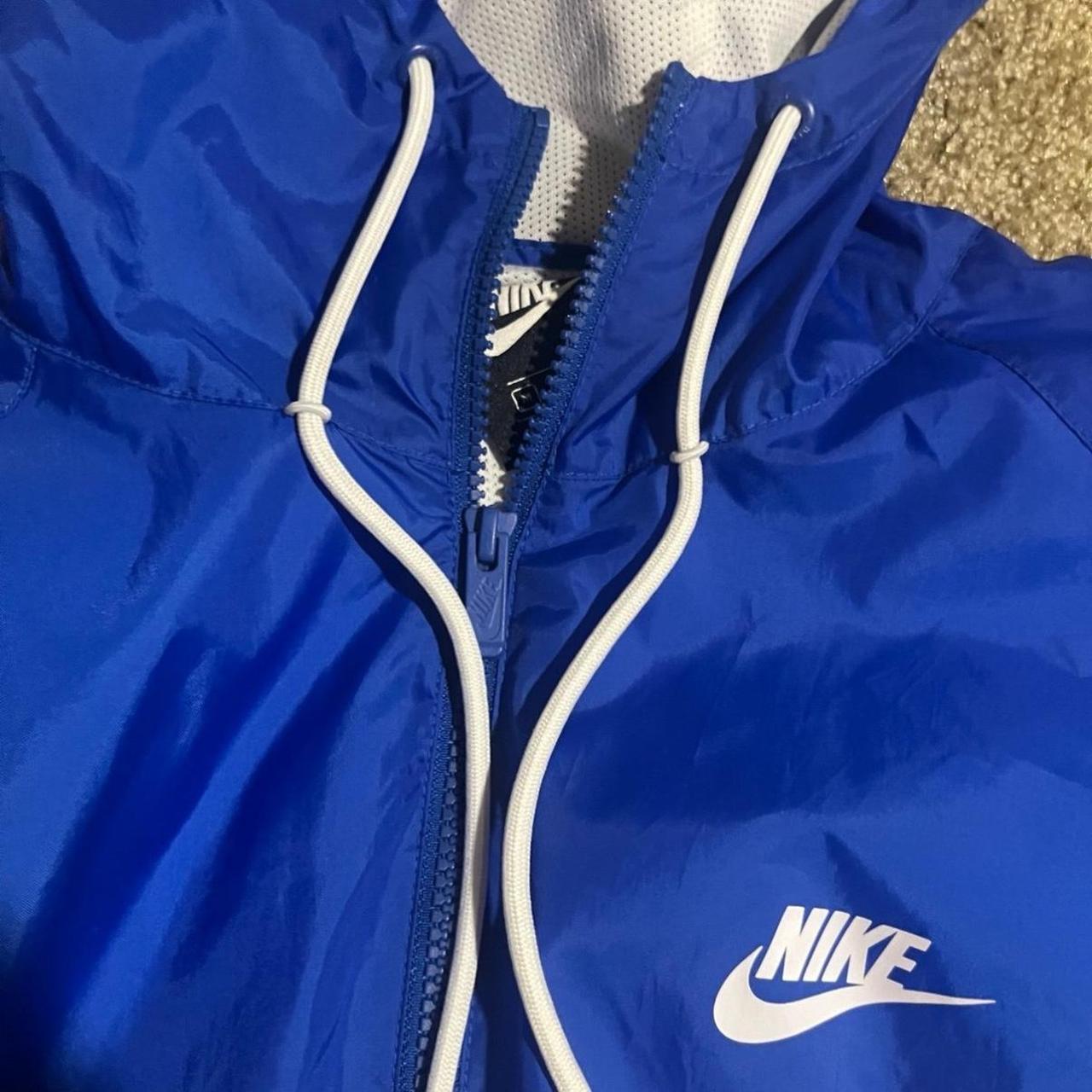 Nike Sportswear Windrunner Blue White size M. Has... | Depop