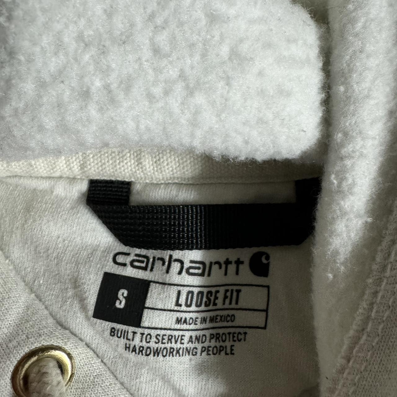 Carhartt cream and white hoodie (has a small stain) - Depop