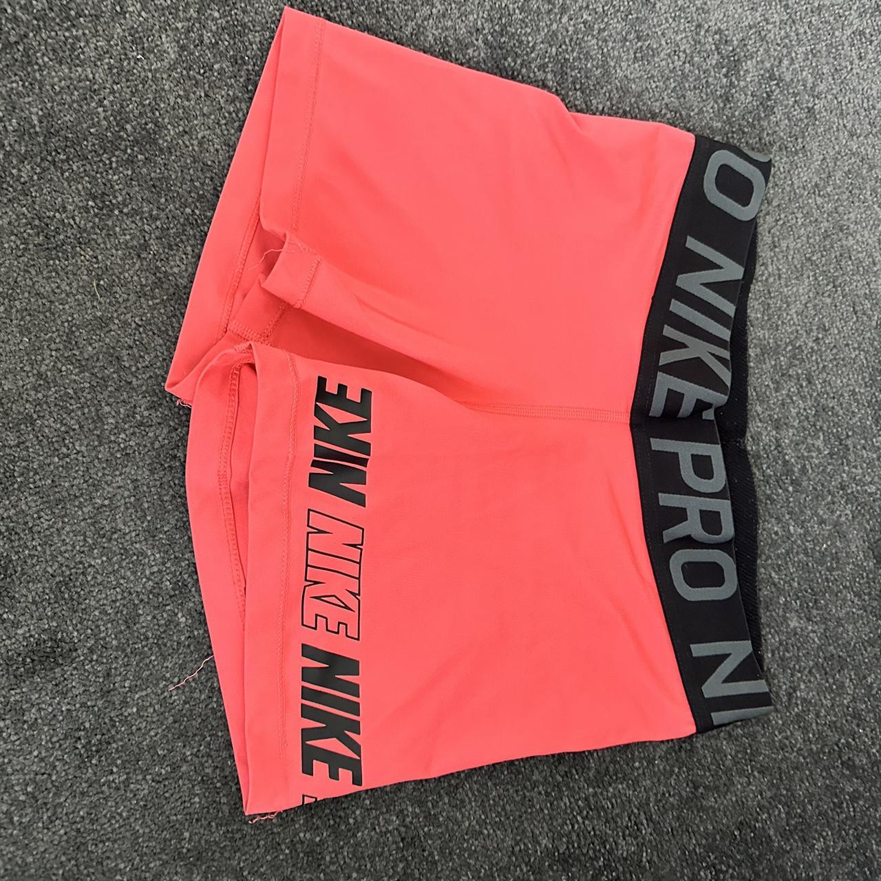 Pink/red Nike pros in a size large. Tags have been... - Depop