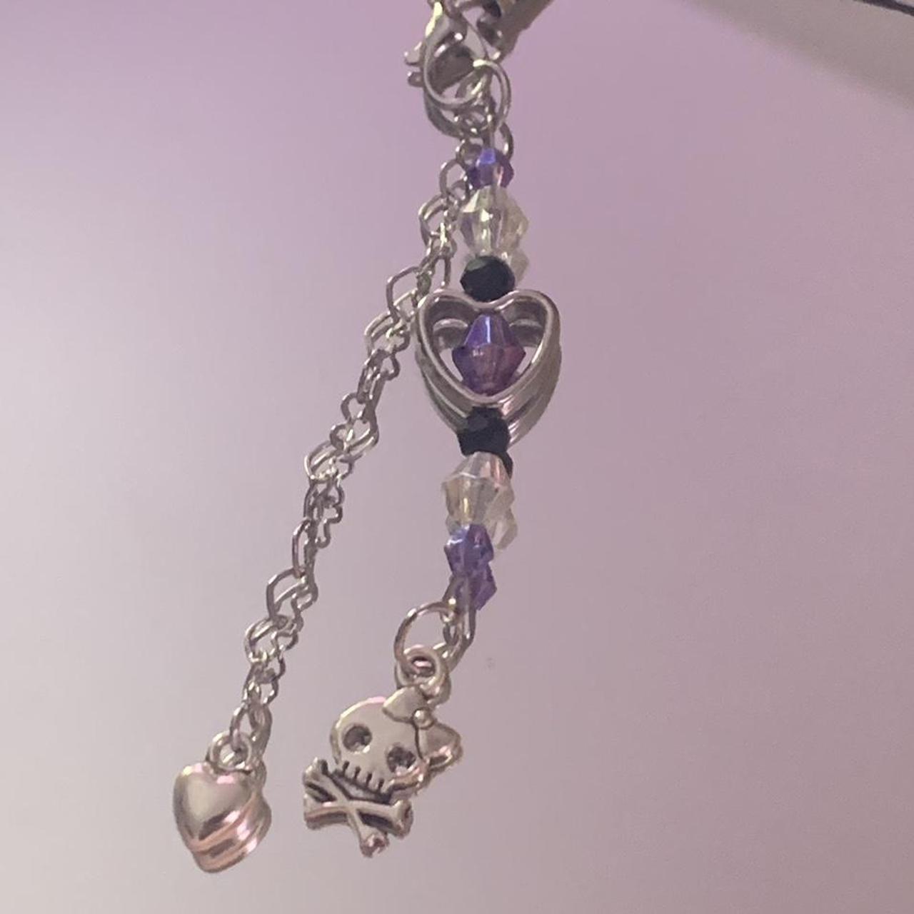 purple and black skullette keychain/phone charm •... - Depop