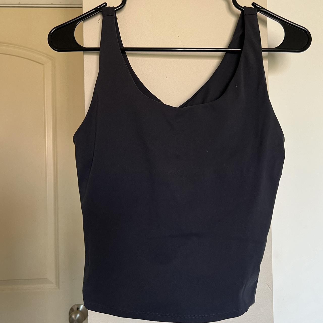 Navy workout top with build in bra Only worn... - Depop