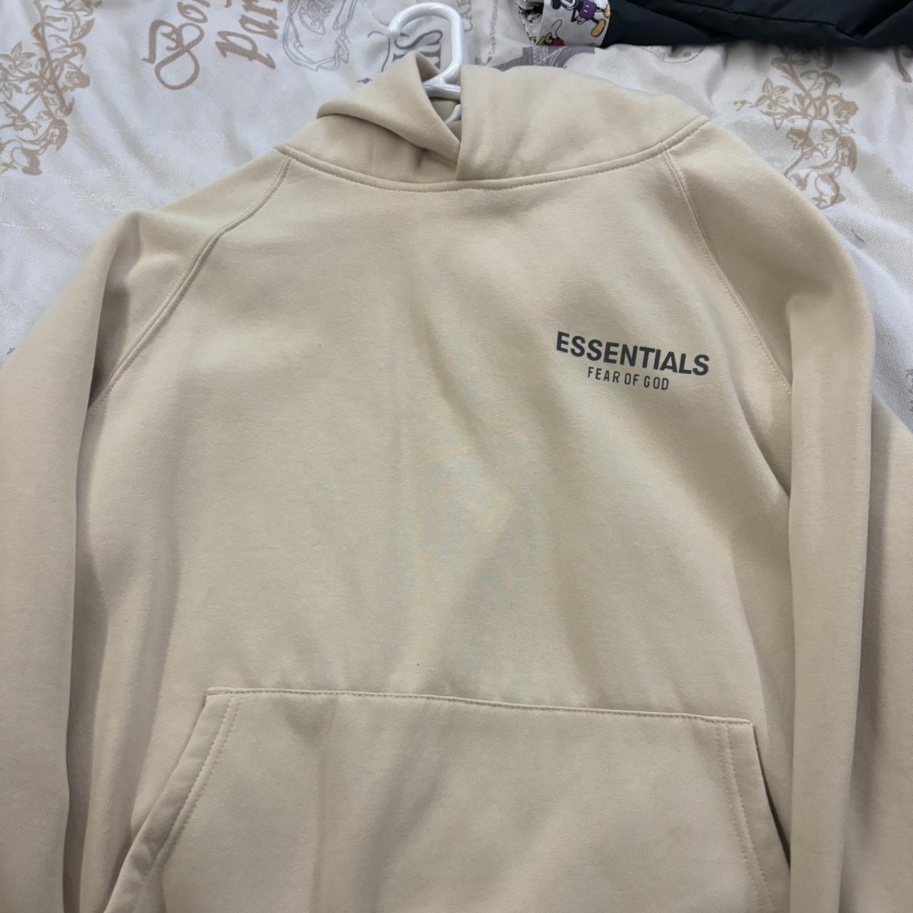 beige essentials hoodie size medium - Depop