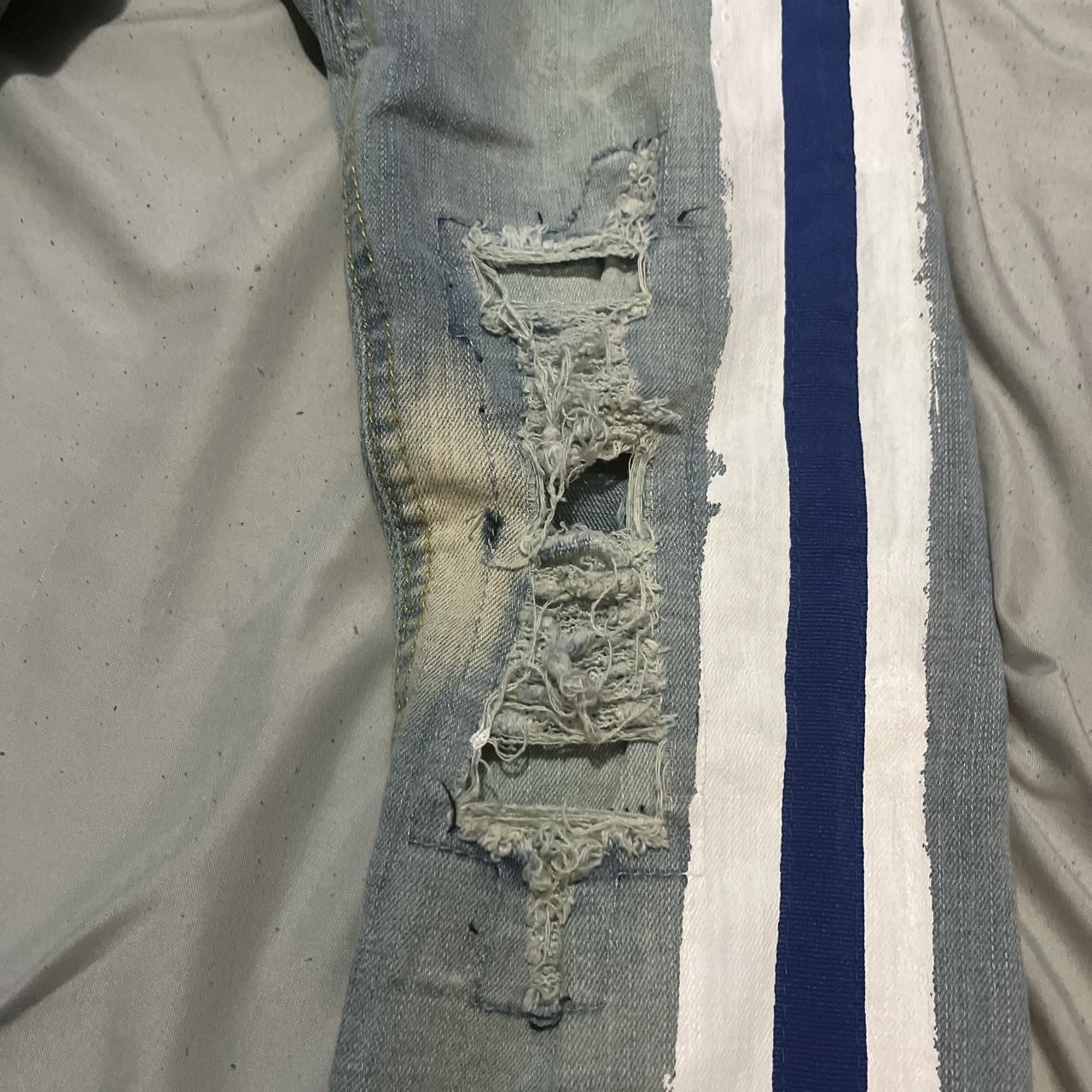 Blue ripped jeans with blue stripe along the side -... - Depop
