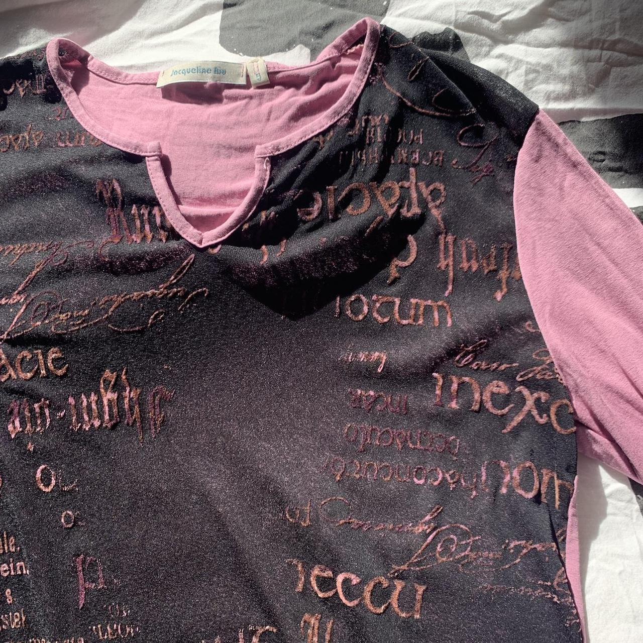 iconic y2k black shirt with v shape notch in the... - Depop