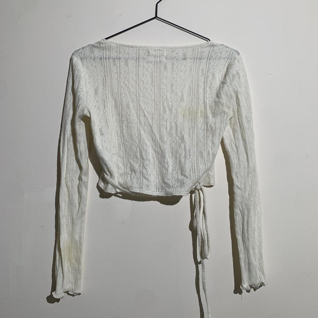urban outfitters ivory wrap top in pointelle texture... | Depop