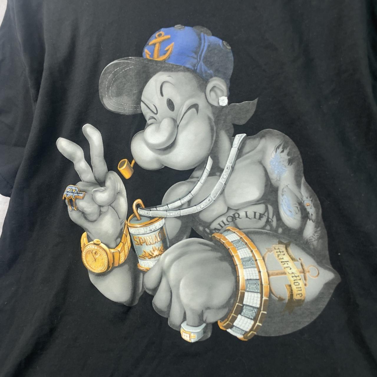 Popeyes Men’s Cartoon With anchor hat holding peace... - Depop