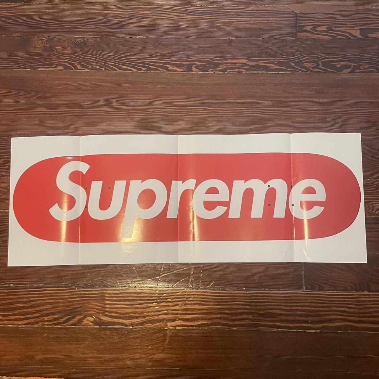 An awesome Supreme poster graces the back of the... - Depop