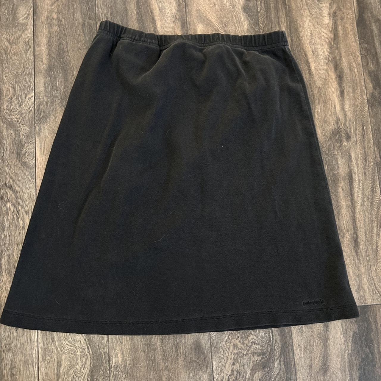 Patagonia basic black mini skirt. Stretchy &... - Depop