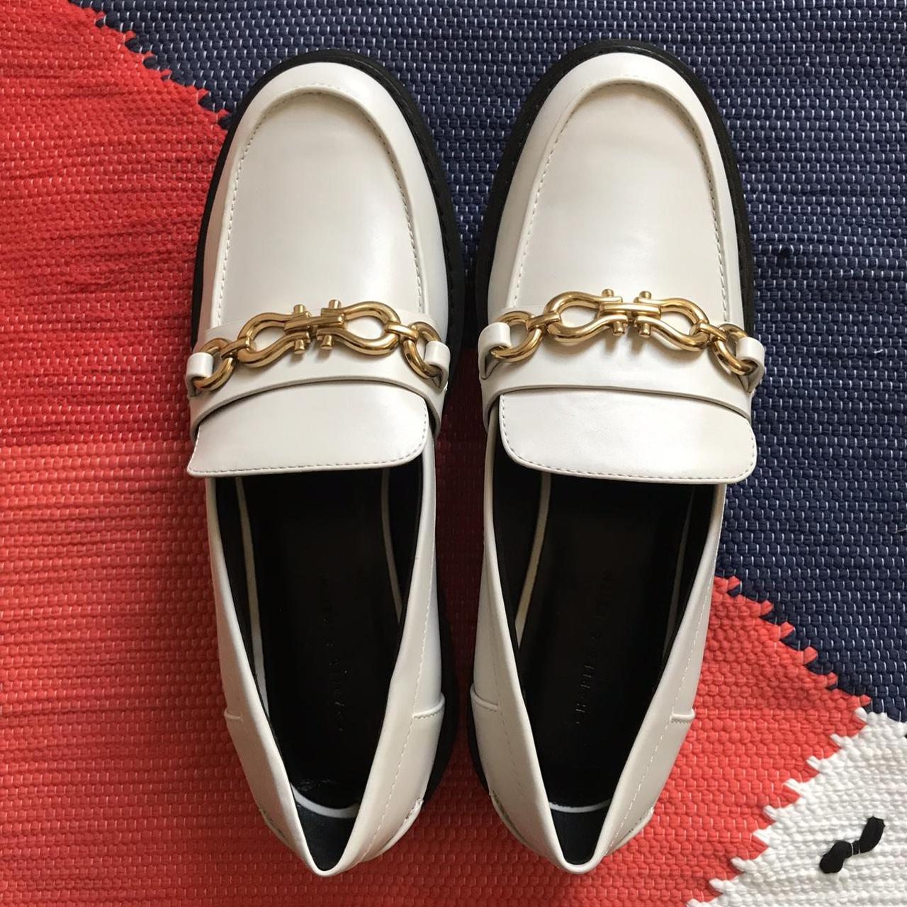 Chunky off-white loafers with chain detail. Faux... - Depop